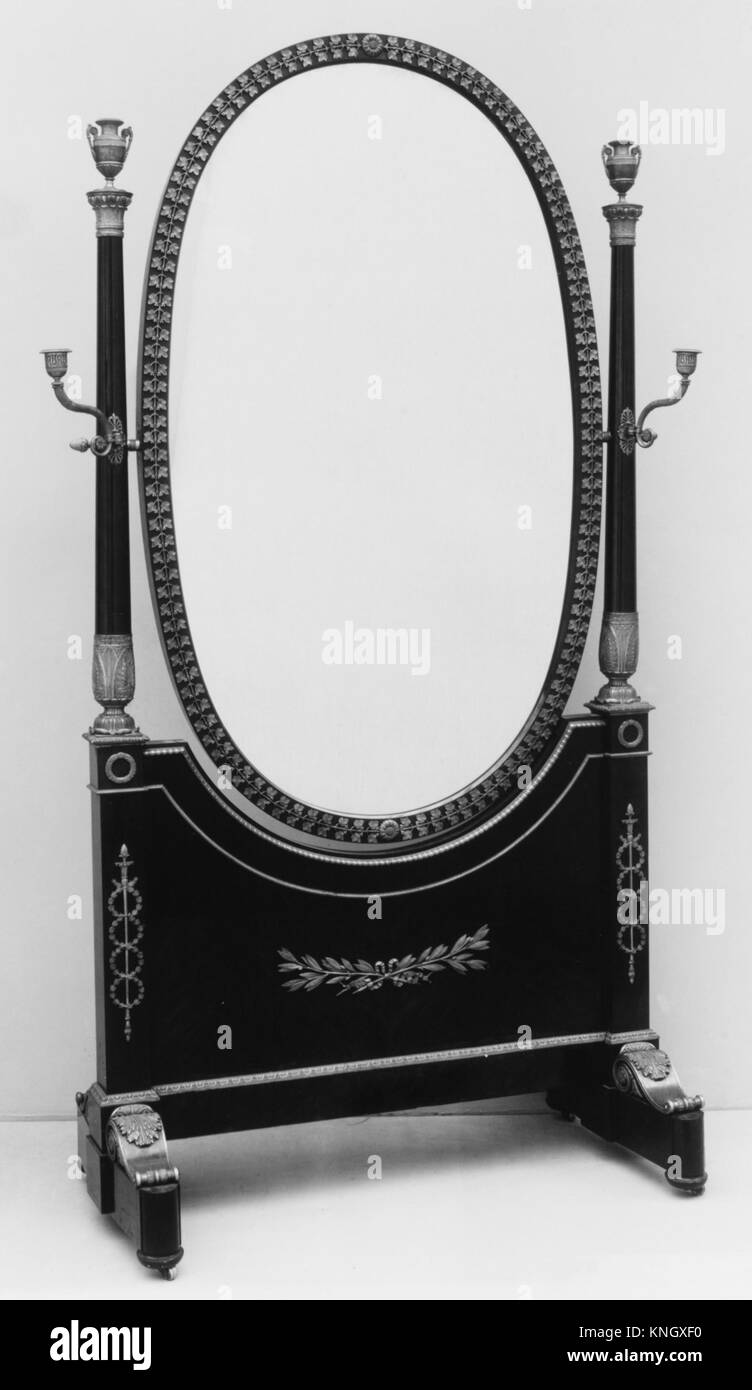 This 19th-century cheval glass is a full-length mirror, exemplifying ...