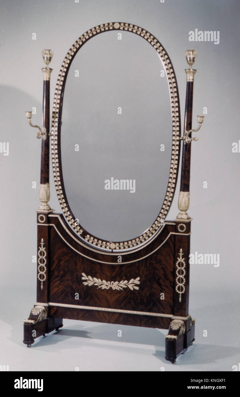 This 19th-century cheval glass is a full-length mirror demonstrating ...