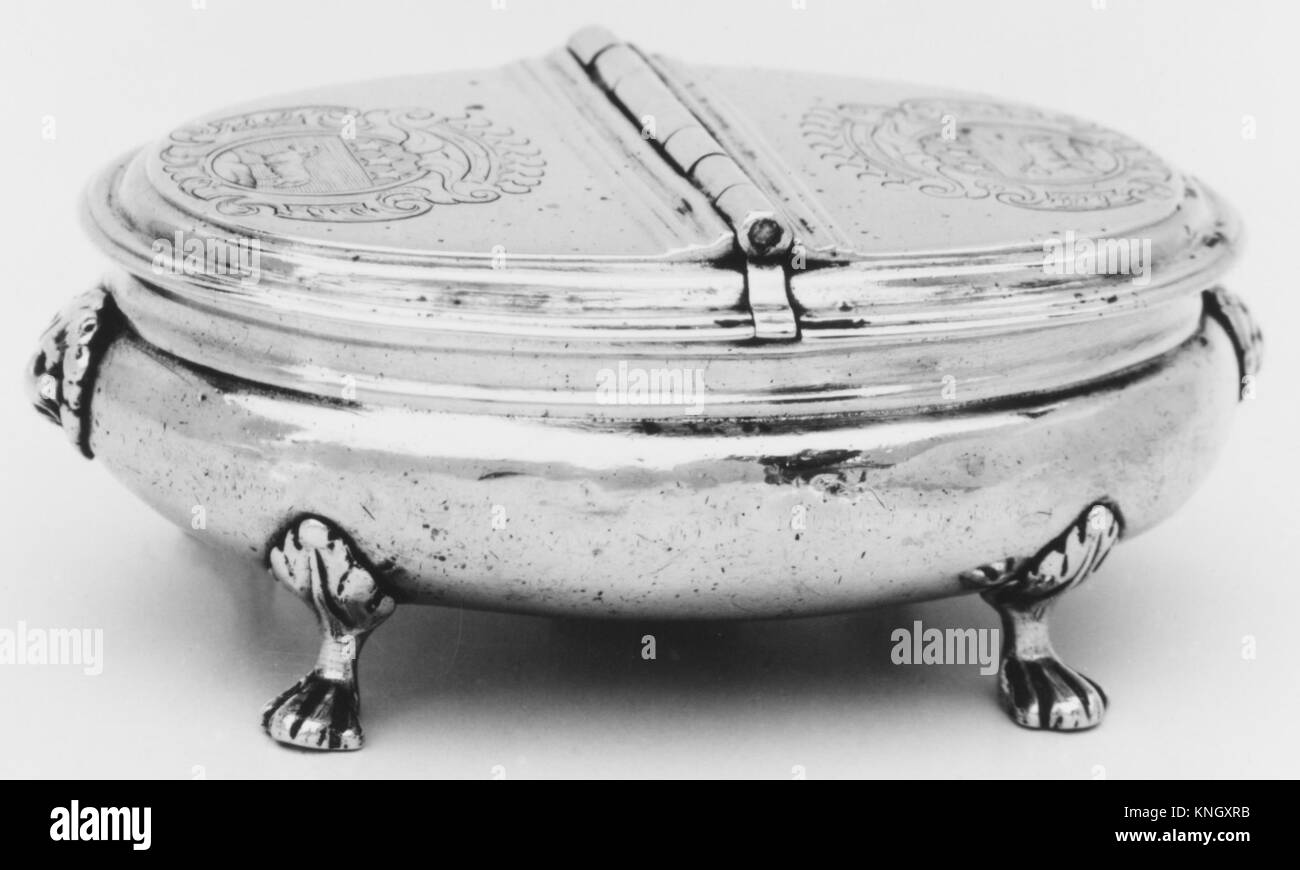 A double salt container, likely used in ancient or medieval times for ...