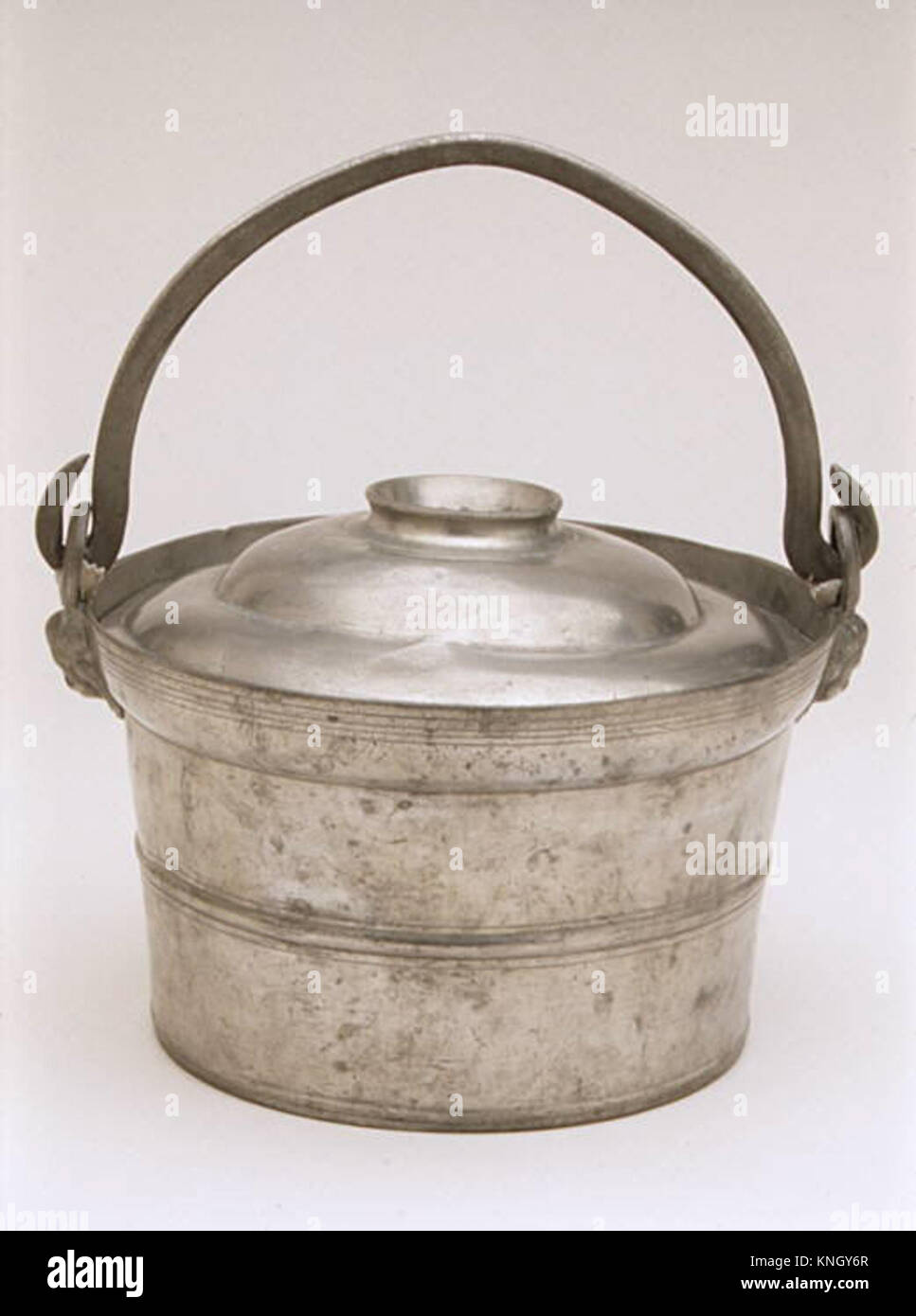 A traditional dinner pail with a cover, known as a porte-dÃ®ner, part ...