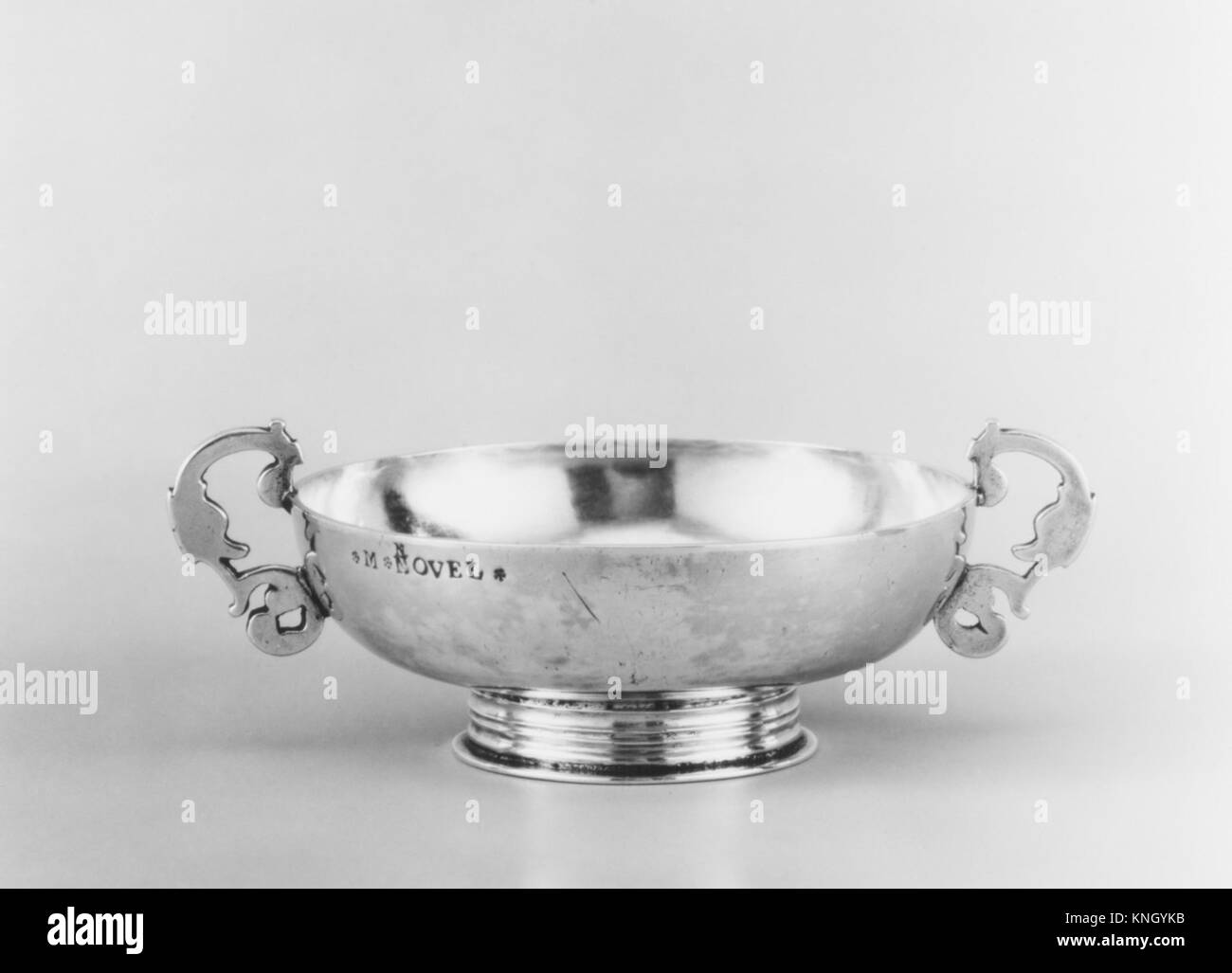 A finely crafted collection cup used in historical rituals or daily ...
