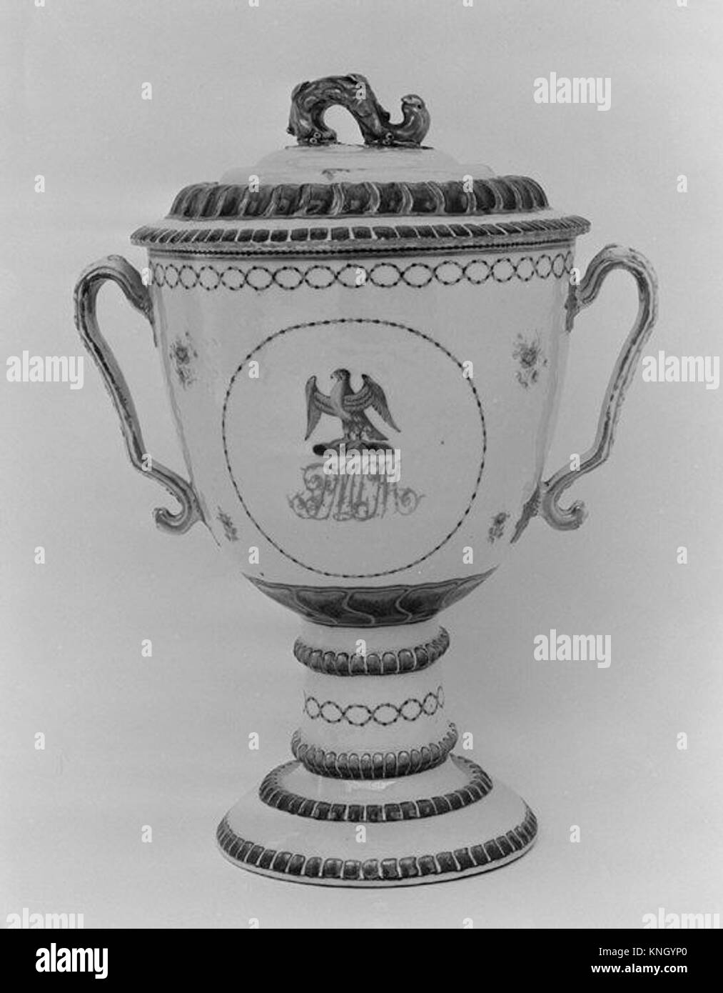 This cup with a cover showcases fine craftsmanship and decorative ...