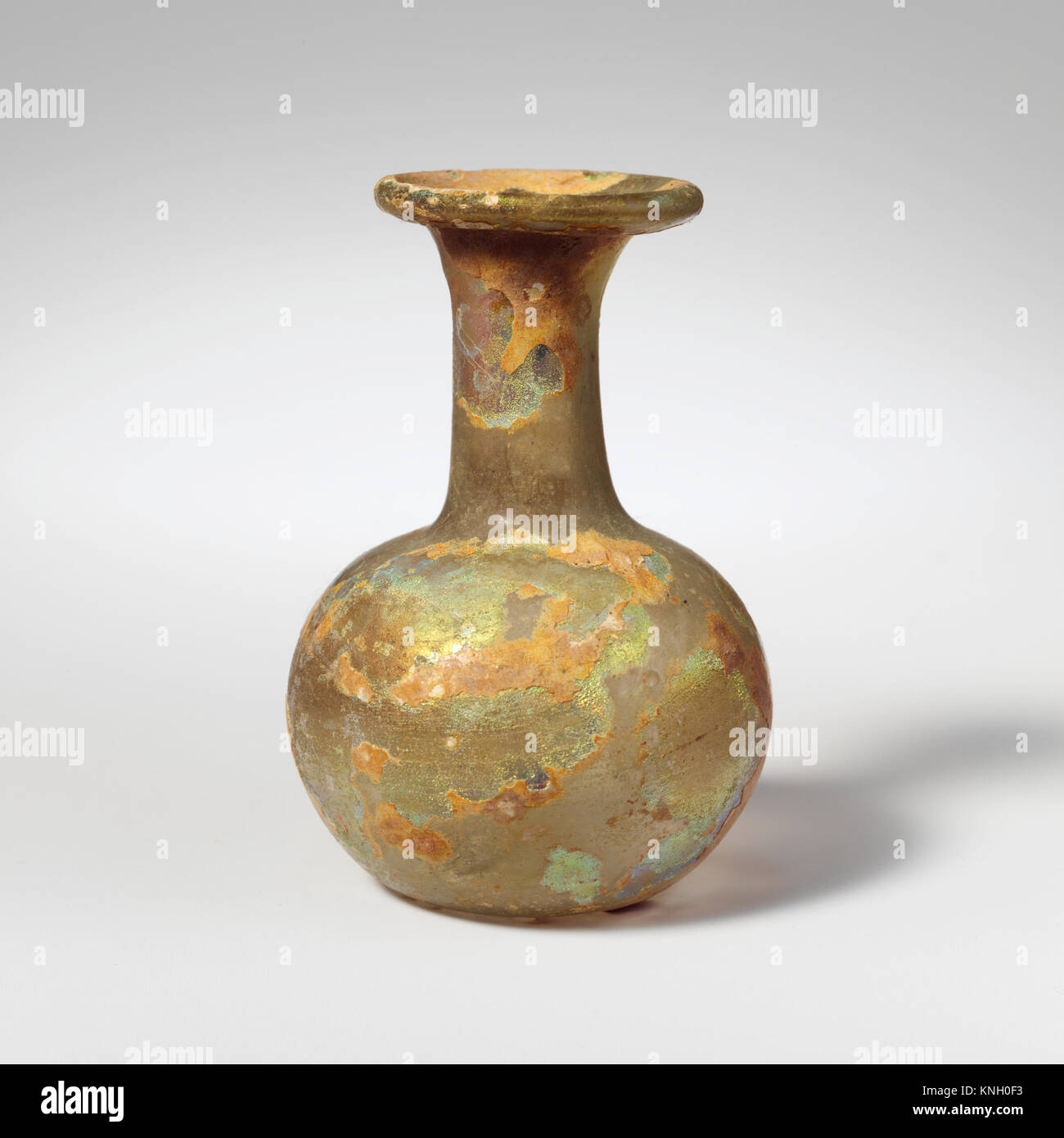 This glass perfume bottle, part of the MET collection, displays ...