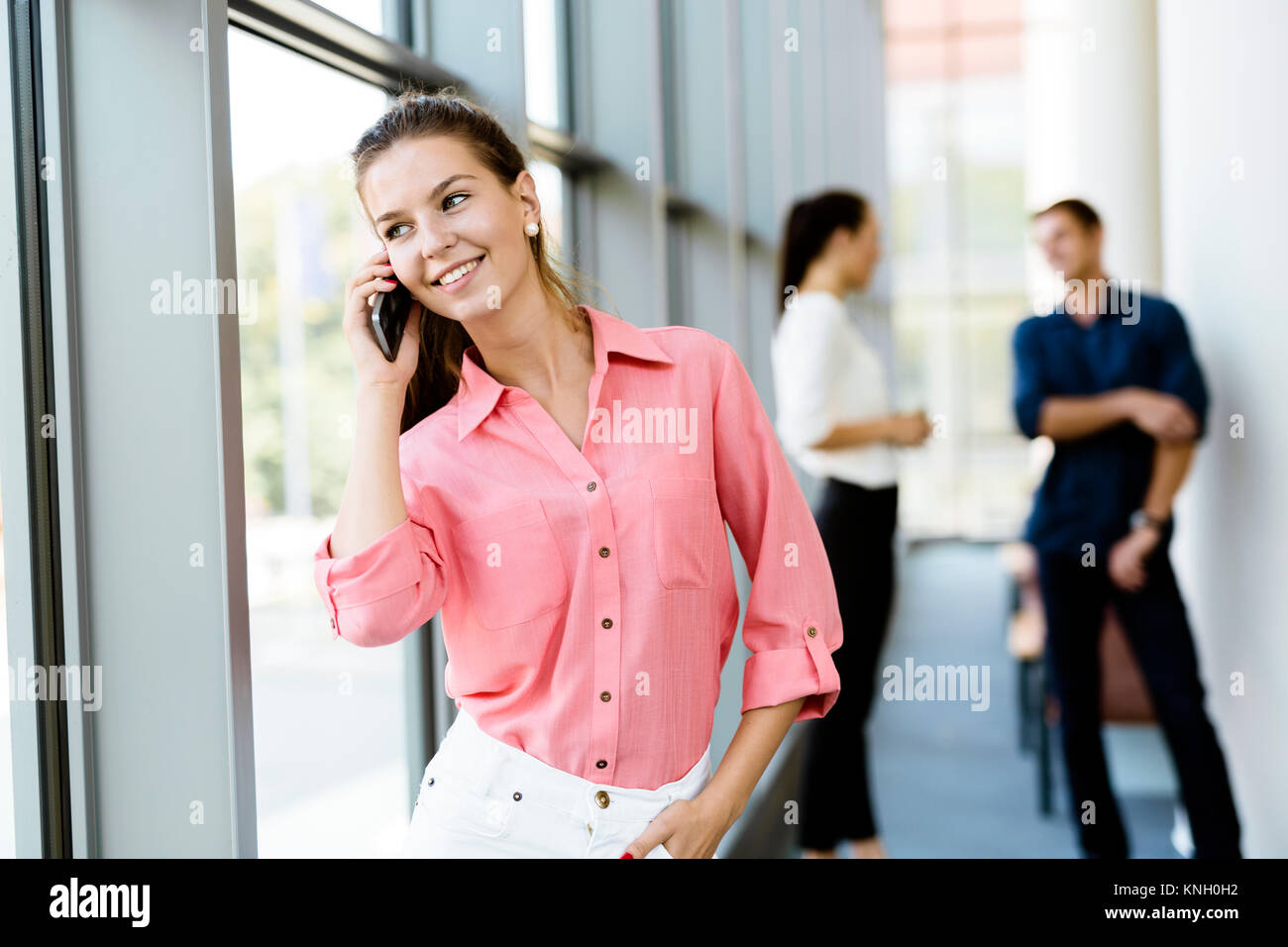 Person people using their mobile phones hi-res stock photography and ...