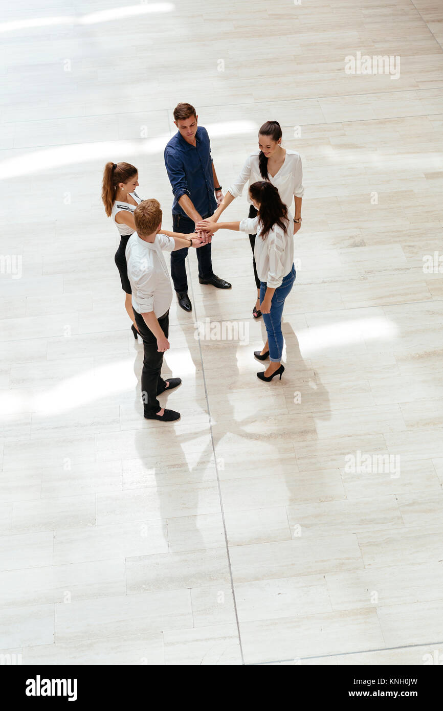 Business teamwork. People with joined hands. Union Stock Photo - Alamy