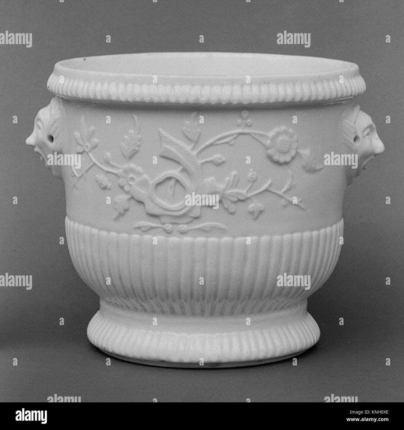 This elegant bottle cooler, part of a paired set, was designed to ...