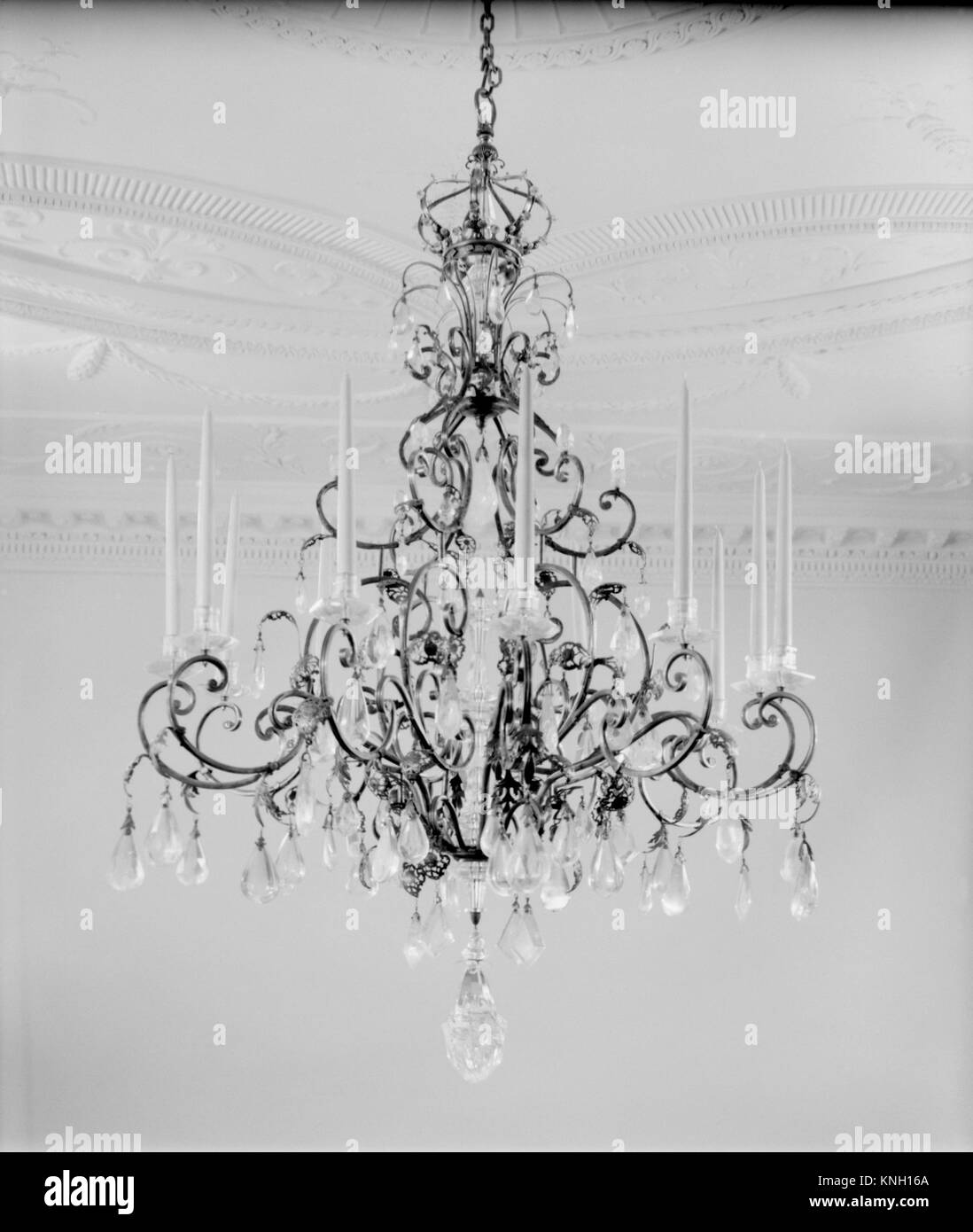 This chandelier, a fine example of historical lighting design, features ...