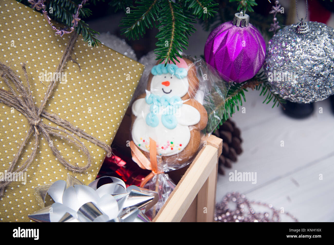 A surprise under a Christmas tree. A wooden drawer filled with a ...