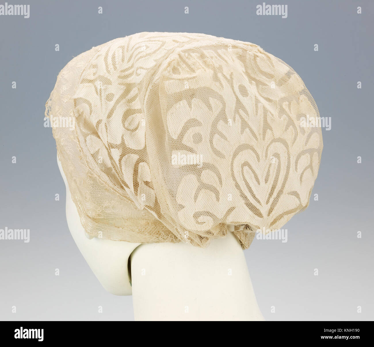 This cap represents historical headwear design, illustrating materials ...