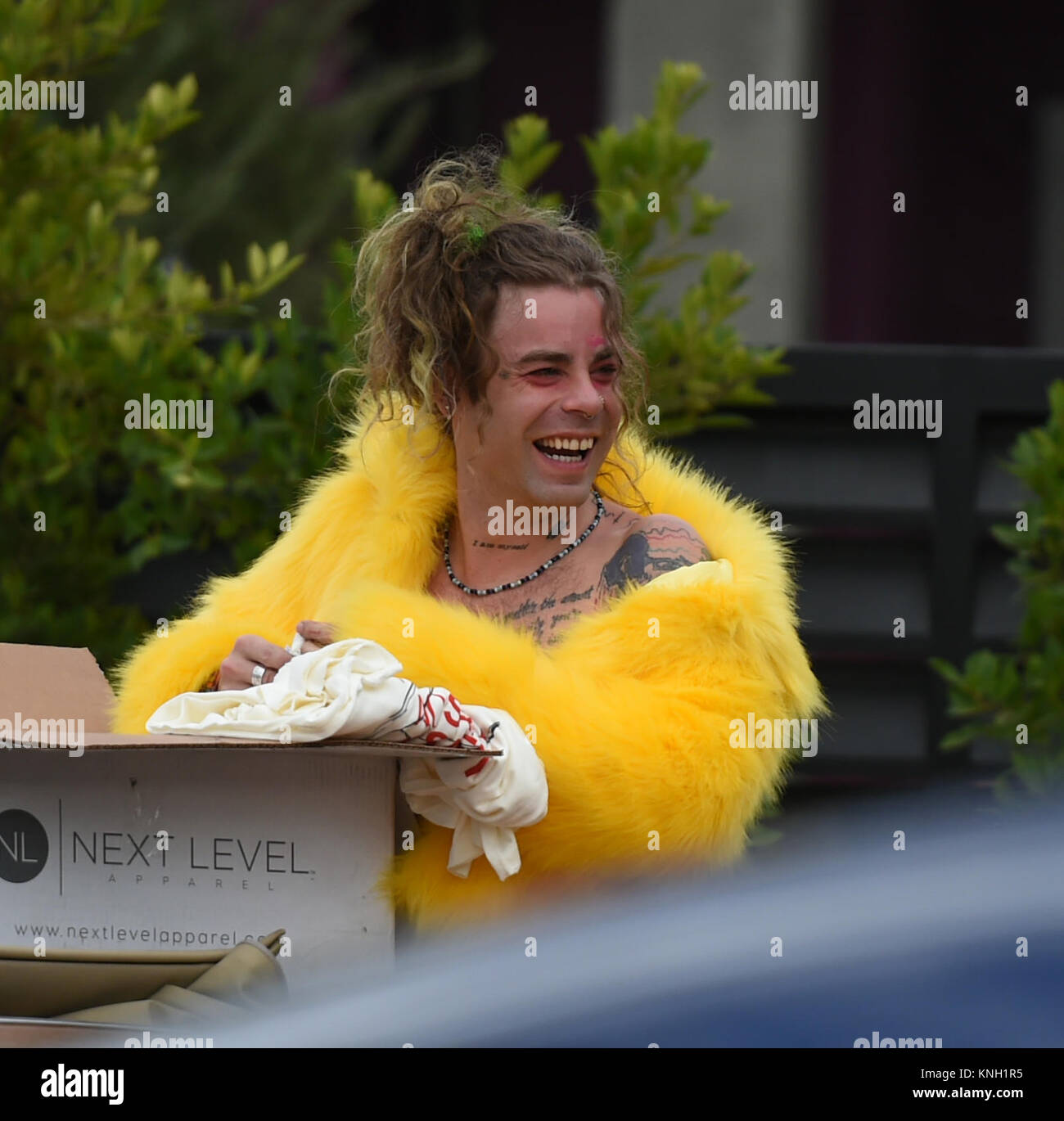 Mod Sun arrives in a vintage Cadillac Eldorado convertible with his dog ...
