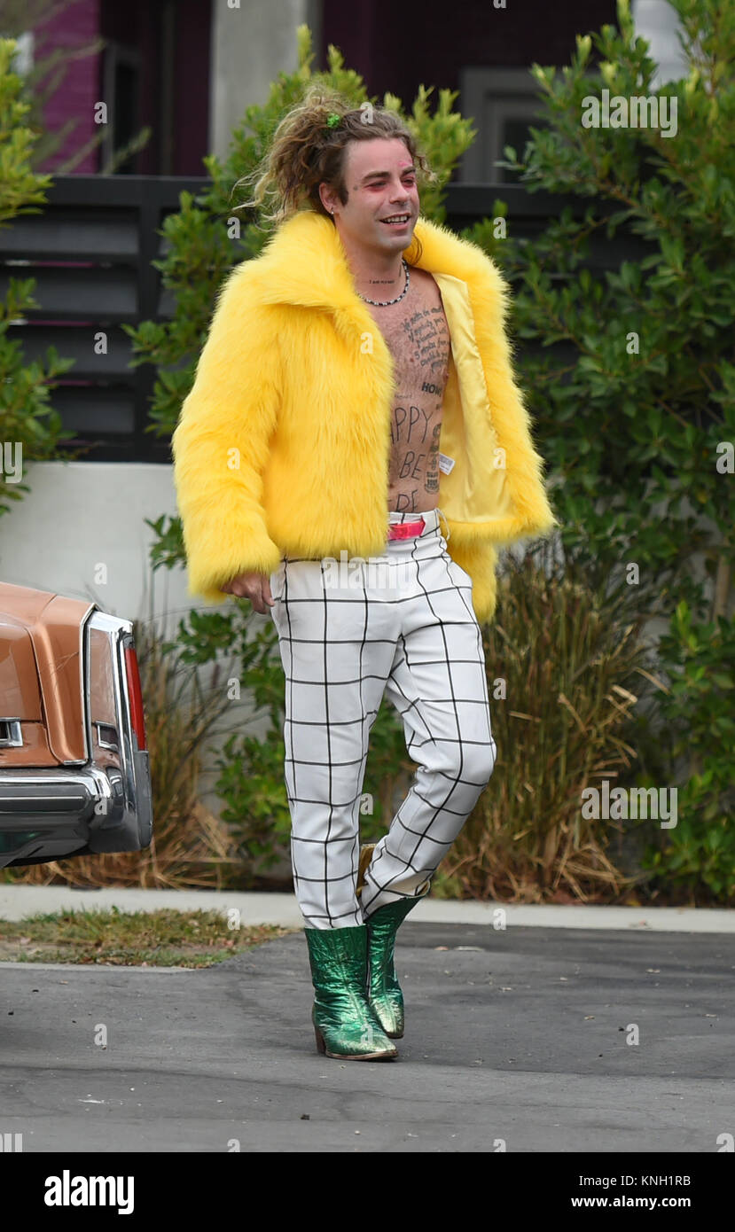 Mod Sun arrives in a vintage Cadillac Eldorado convertible with his dog ...