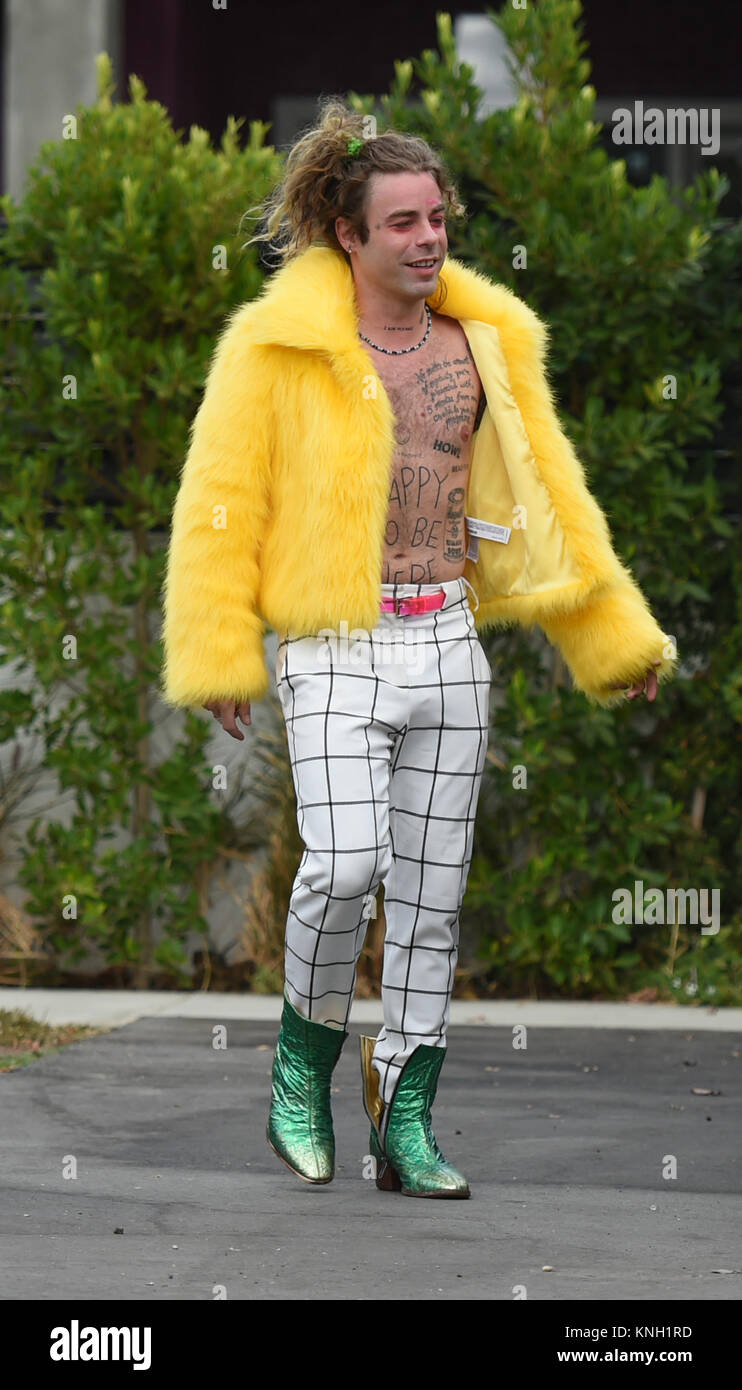 Mod Sun arrives in a vintage Cadillac Eldorado convertible with his dog ...