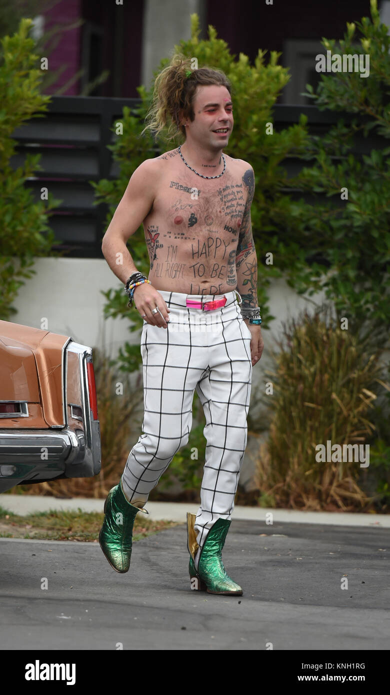 Mod Sun arrives in a vintage Cadillac Eldorado convertible with his dog ...