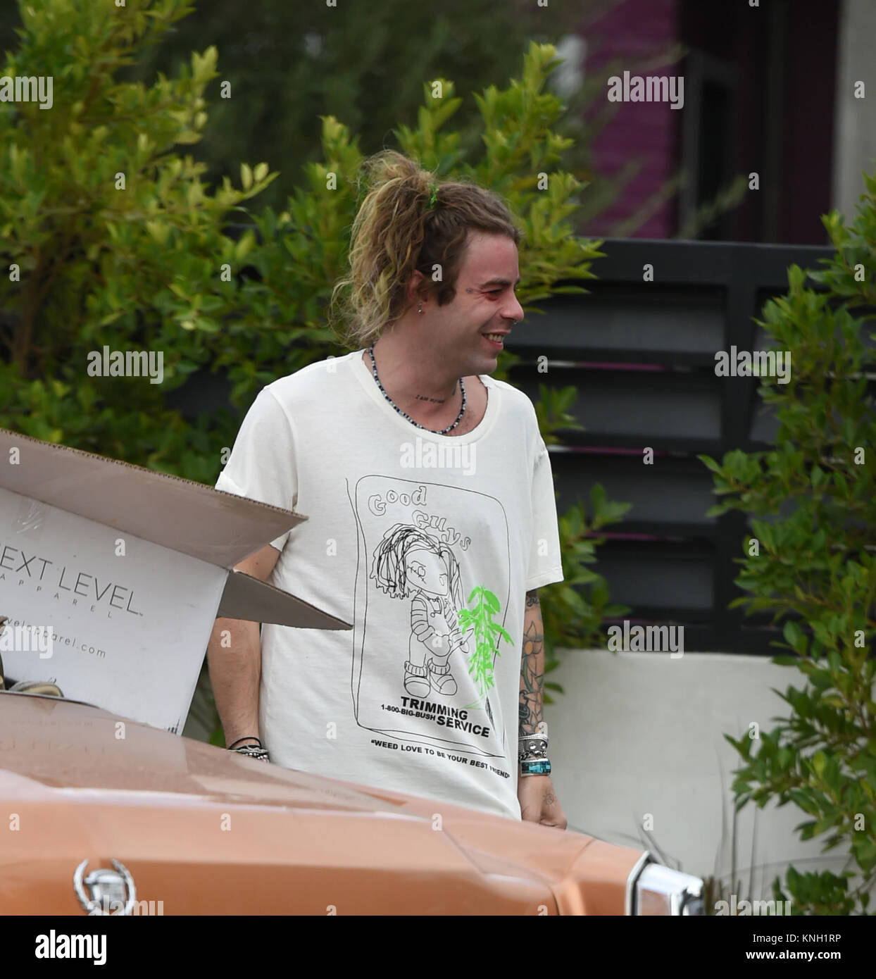 Mod Sun arrives in a vintage Cadillac Eldorado convertible with his dog ...