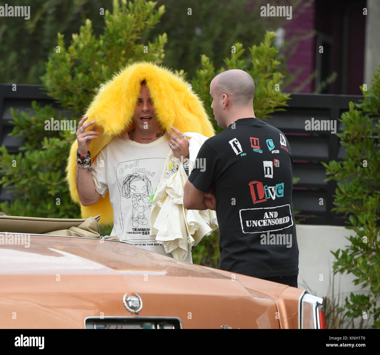Mod Sun arrives in a vintage Cadillac Eldorado convertible with his dog ...