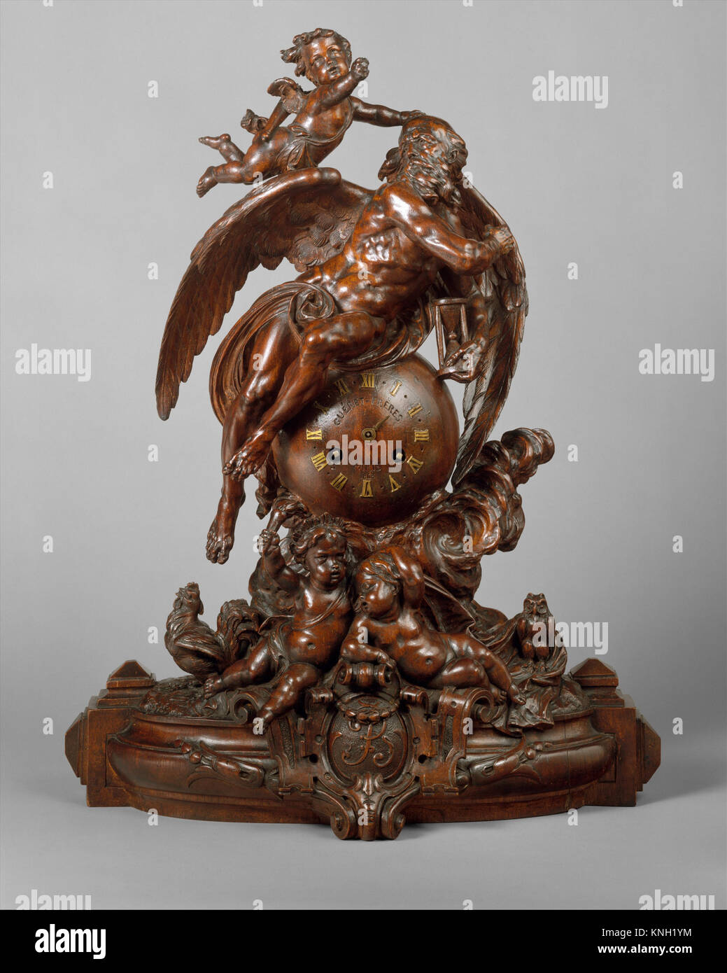 This clock, featuring Father Time, is an intricate representation of ...