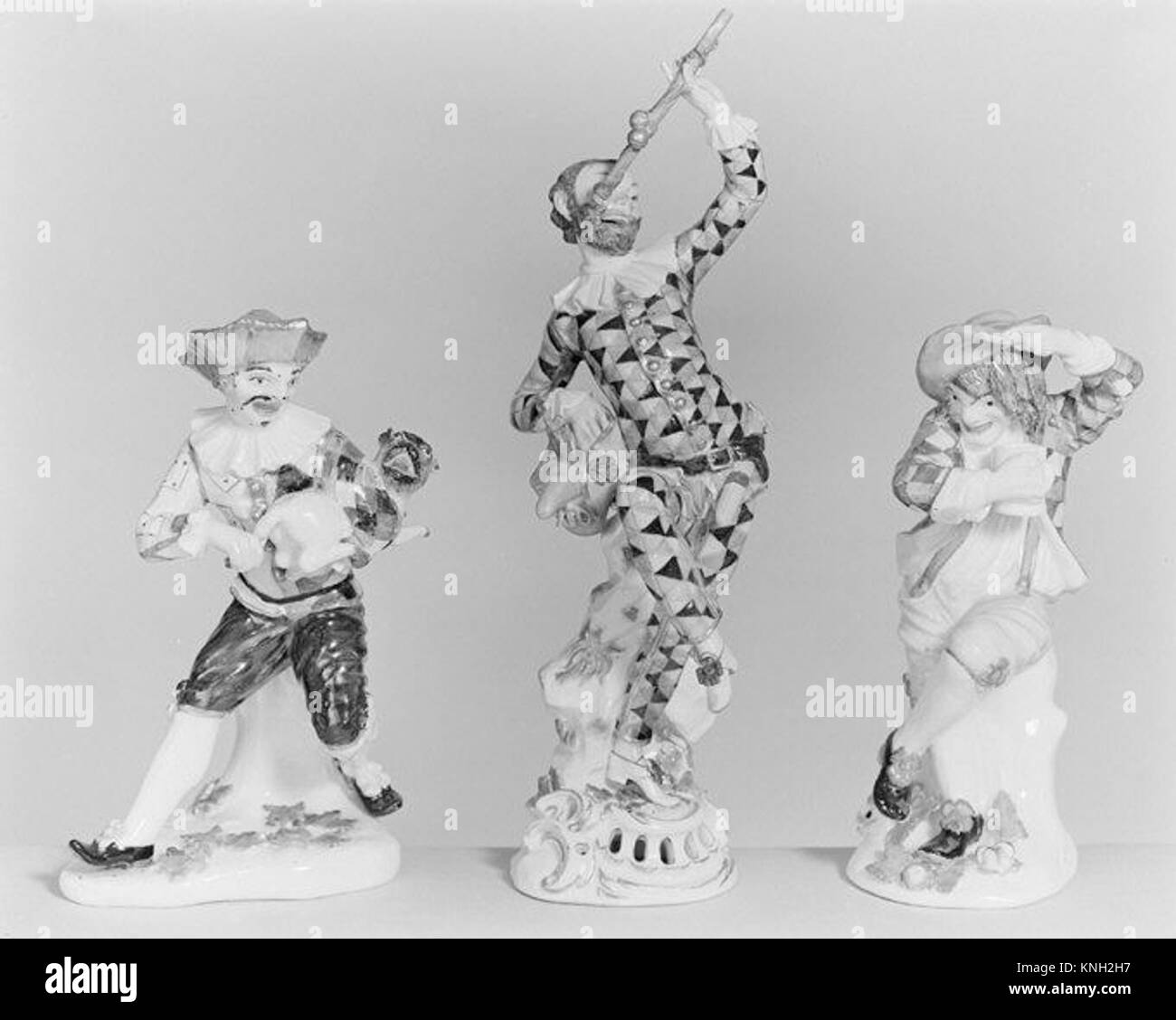 This artwork depicts a Harlequin dancer, highlighting the theatrical ...