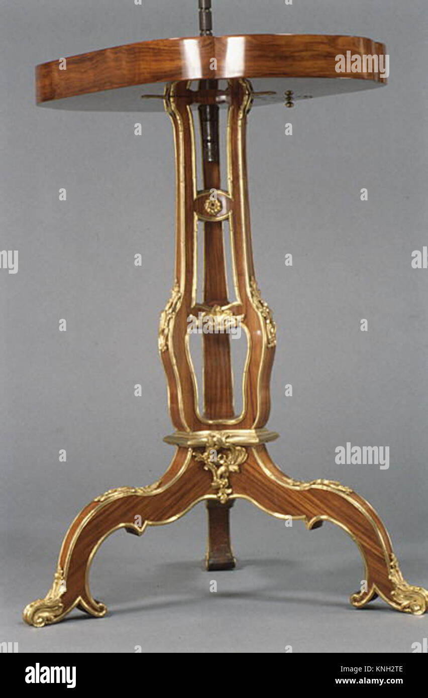 This adjustable reading and writing table, a functional design from its ...