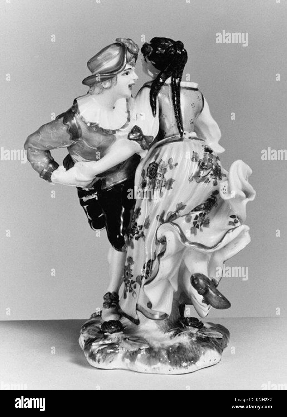 This artwork depicts Dutch dancers in traditional costumes ...