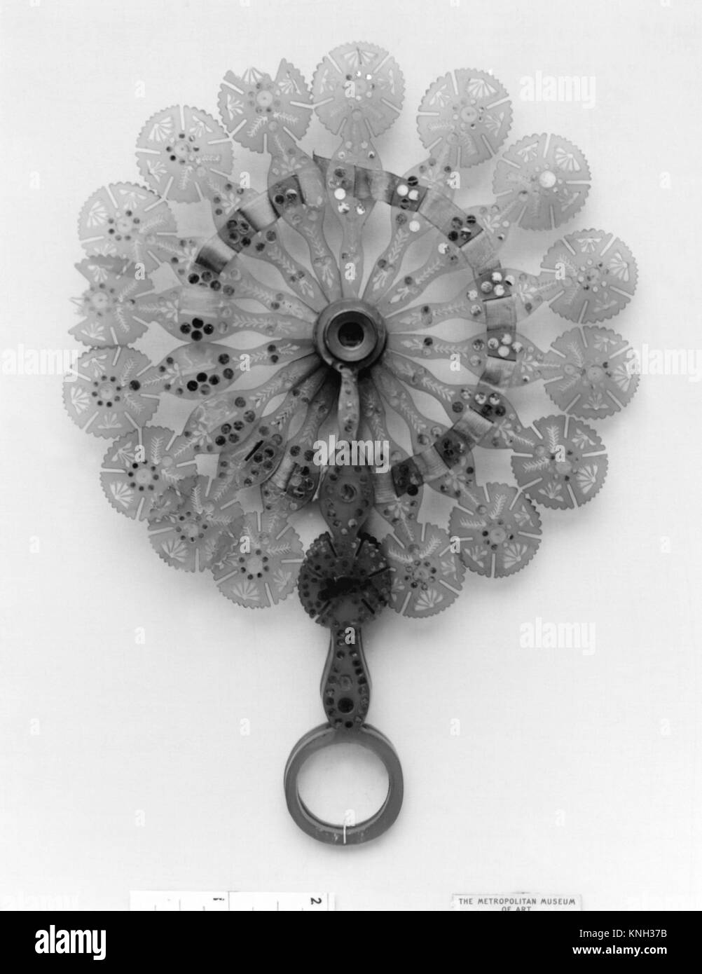 An elegant fan, part of the museum's collection, representing ...