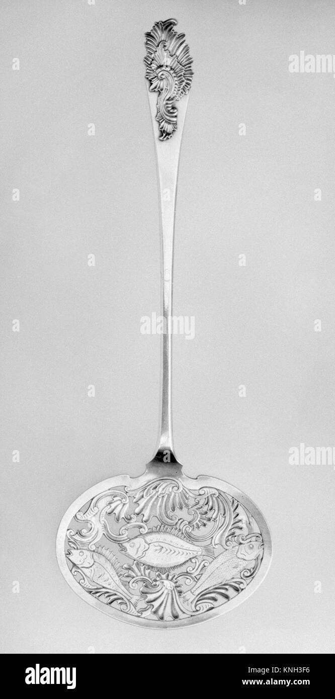 This fish slice is an elegant serving utensil used for presenting fish ...
