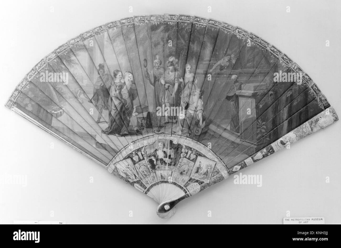 This fan, made from fine materials, is both a functional and decorative ...