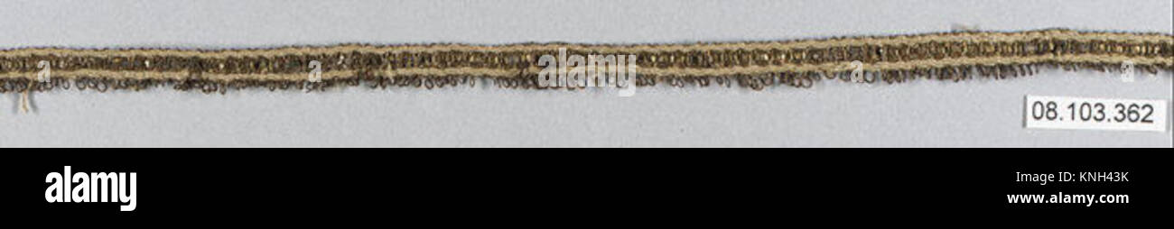 This galloon, a type of decorative trim, features intricate patterns ...