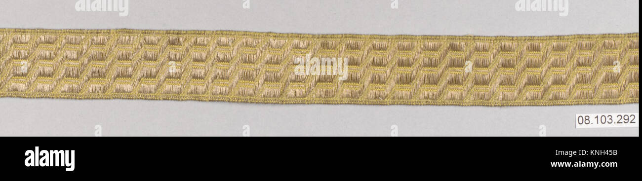 A galloon, a decorative trim used in textiles. This piece highlights ...