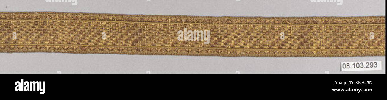 This galloon, a type of lace or trim, features intricate design and ...