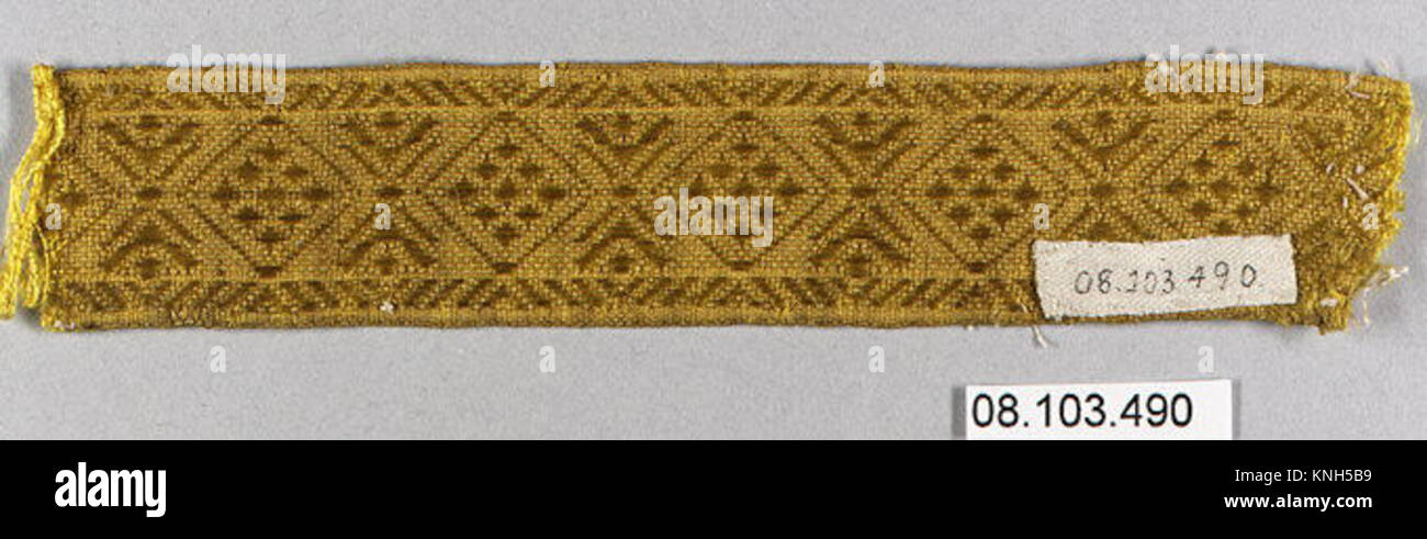 This galloon, a decorative braid or trim, features intricate design ...