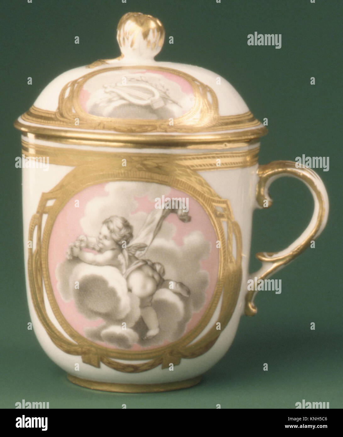 This cup with cover, part of a larger tea service, showcases fine ...