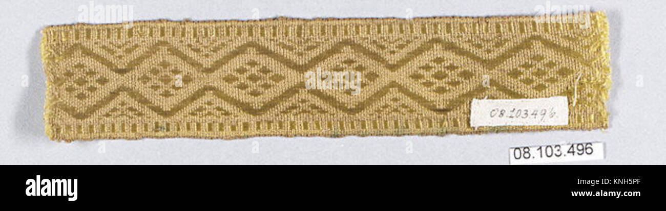 This galloon, a type of decorative trim, showcases intricate ...