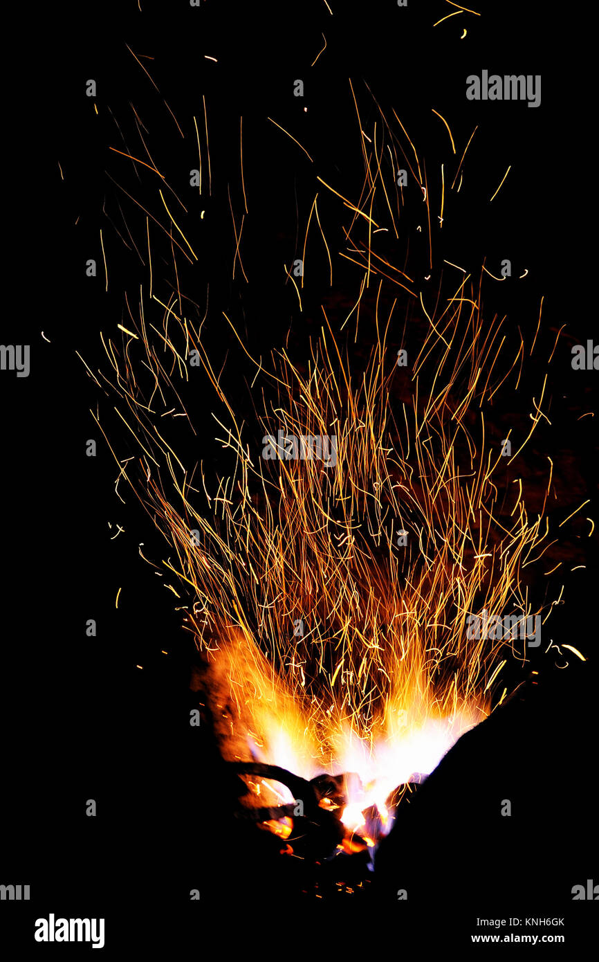 Smithy fire flame tips with sparks closeup on dark background Stock ...