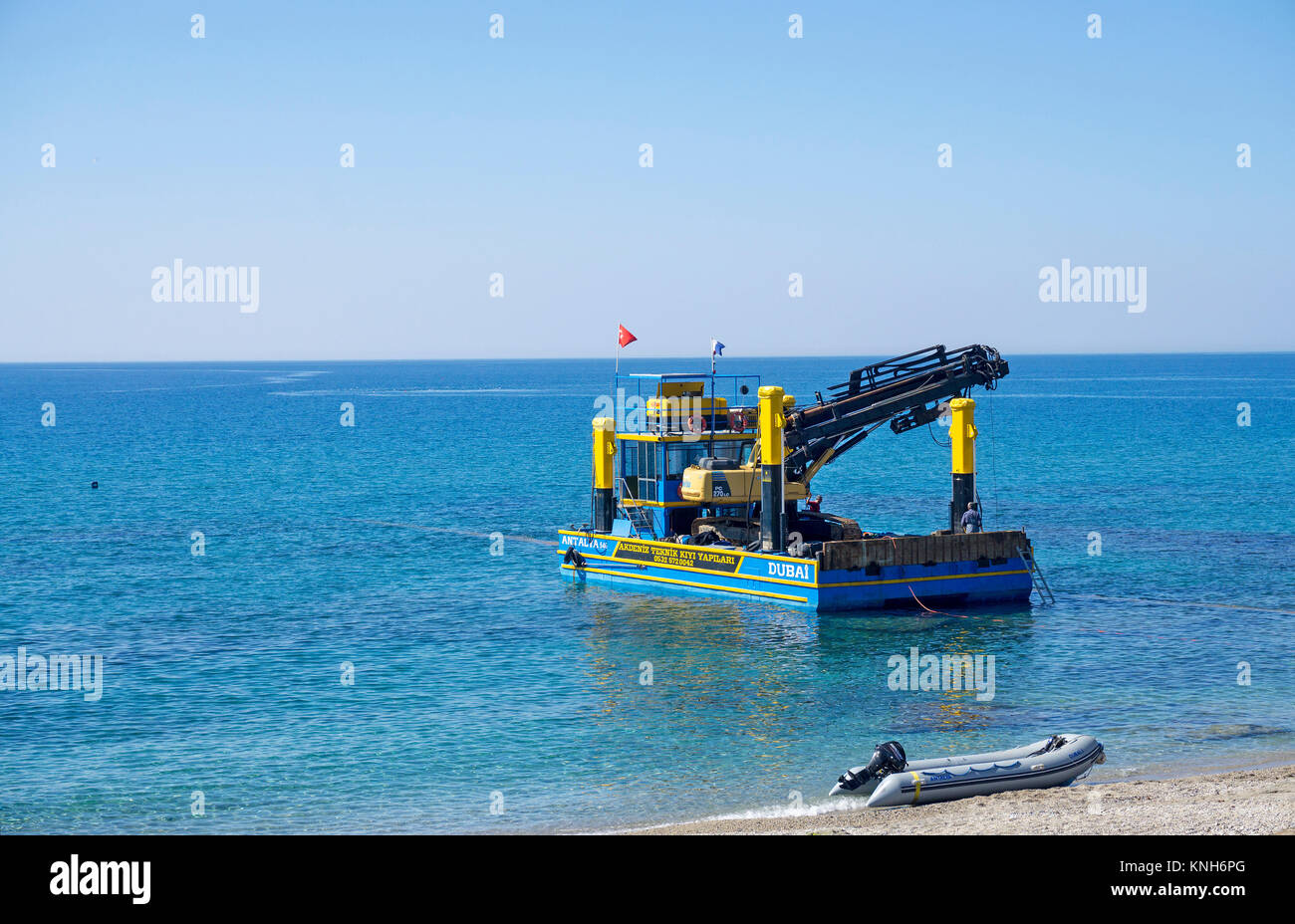 Floating dredger repairing pipes at the beach, Alanya, turkish riviera ...