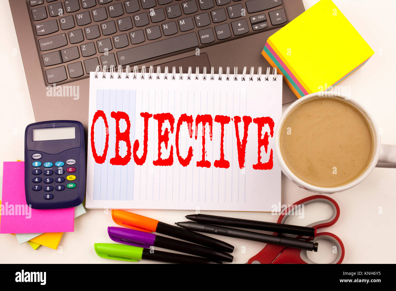 Word writing Objective in the office with laptop, marker, pen ...