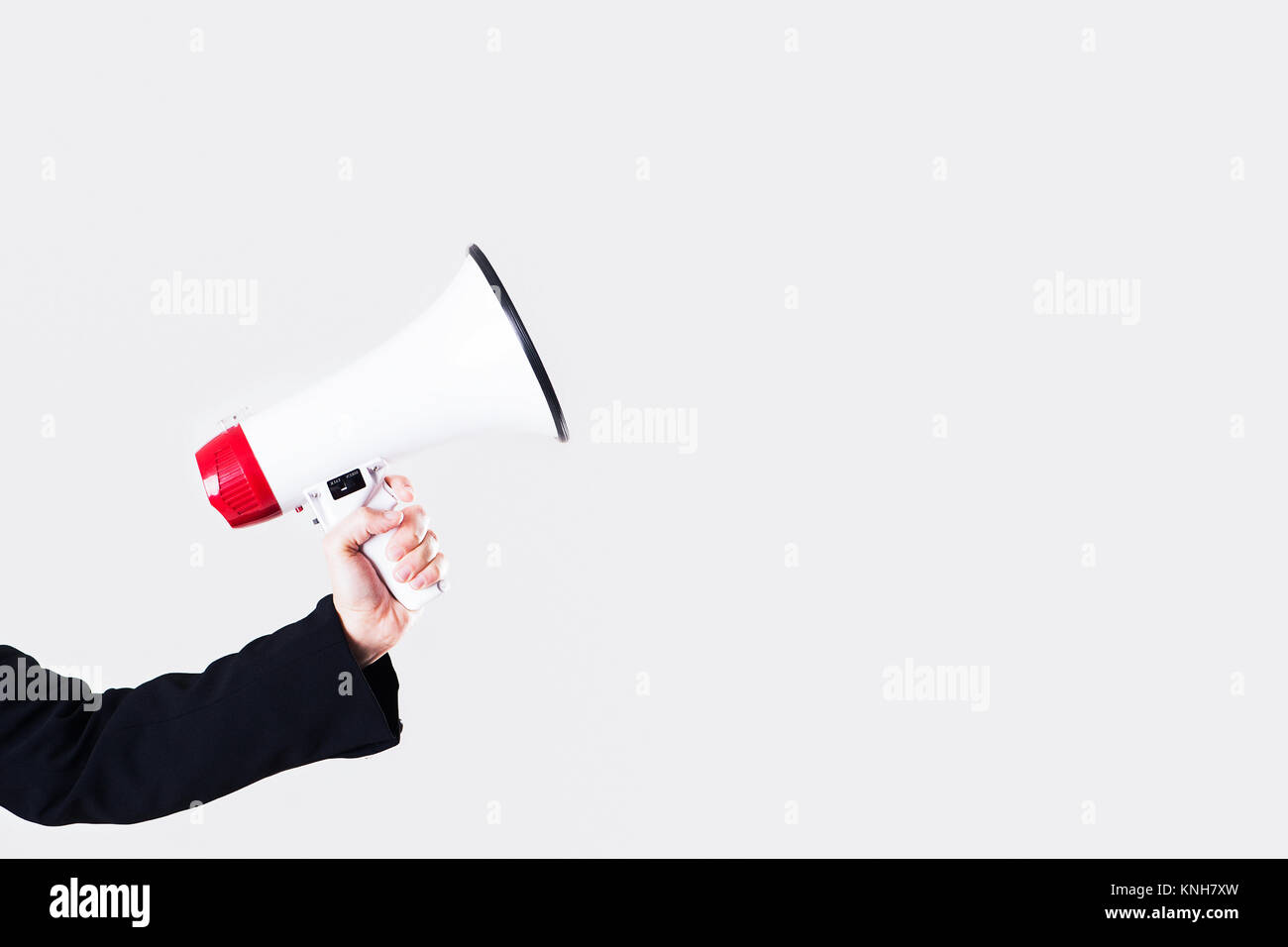 Business woman hand holding a Megaphone Stock Photo - Alamy