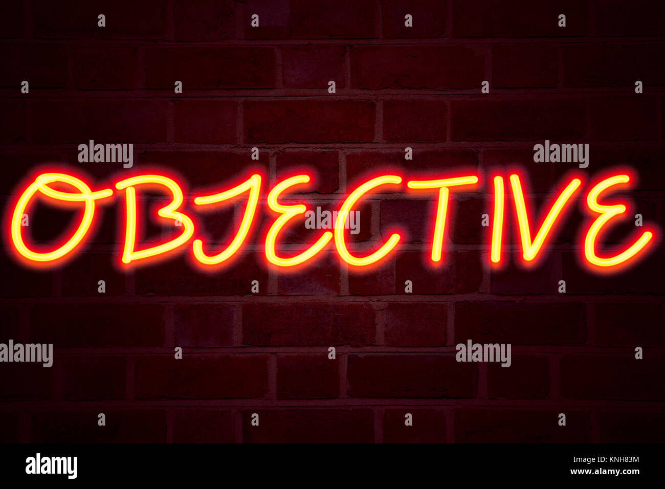 Objective neon sign on brick wall background. Fluorescent Neon tube ...