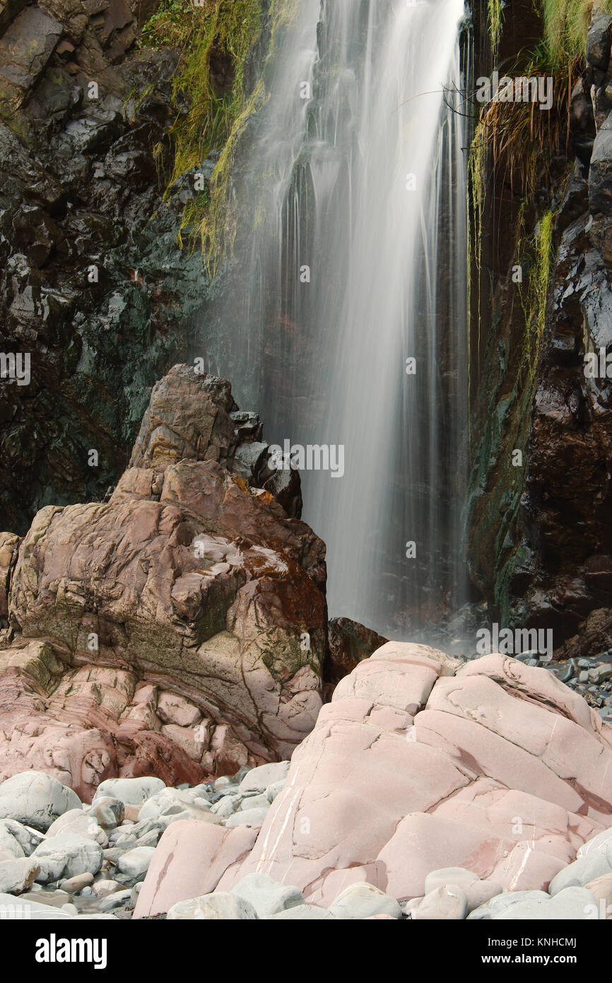 Clovelly beach waterfall hi-res stock photography and images - Alamy