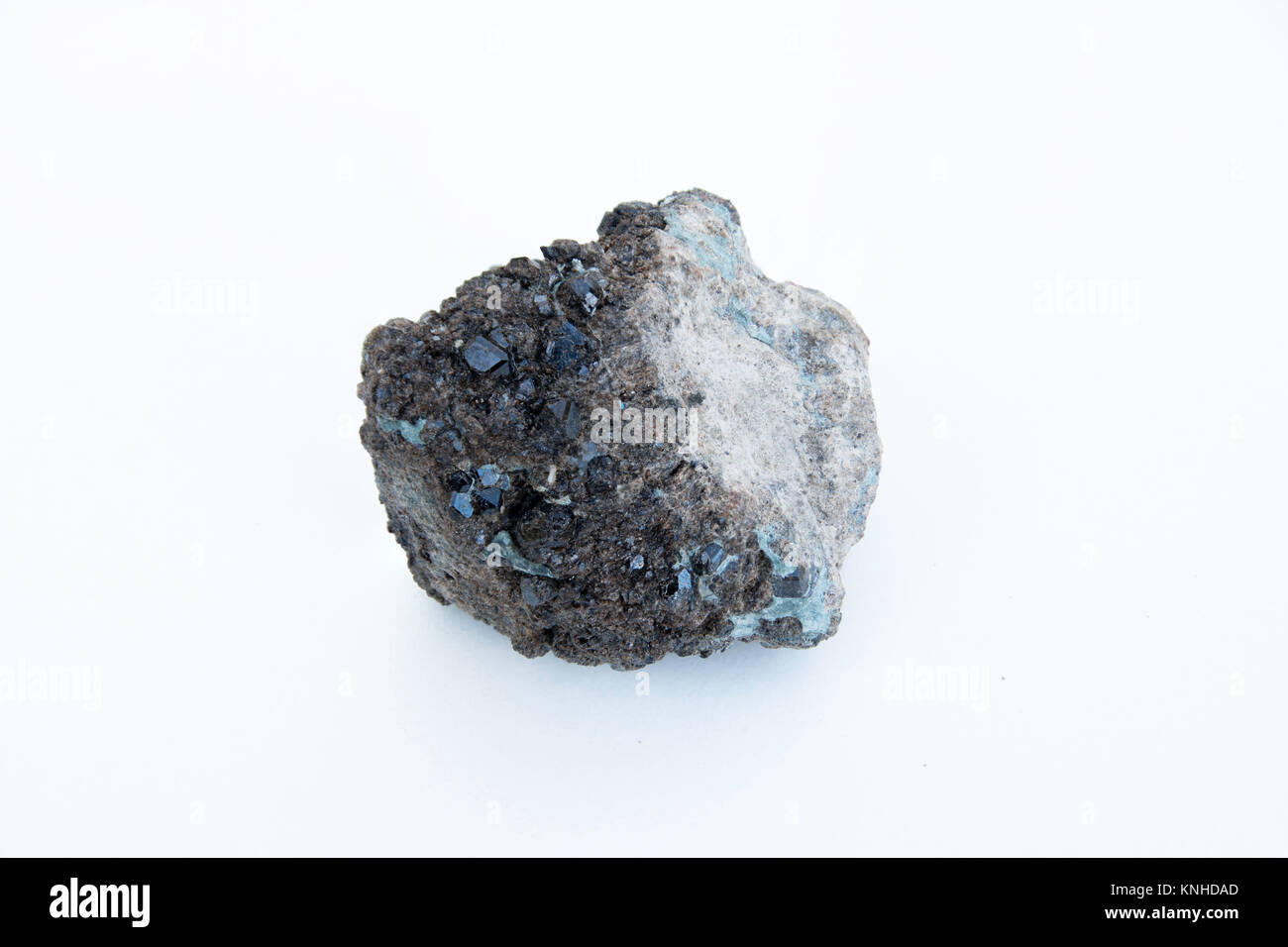 extreme close up of Andradite mineral isolated over white background in ...