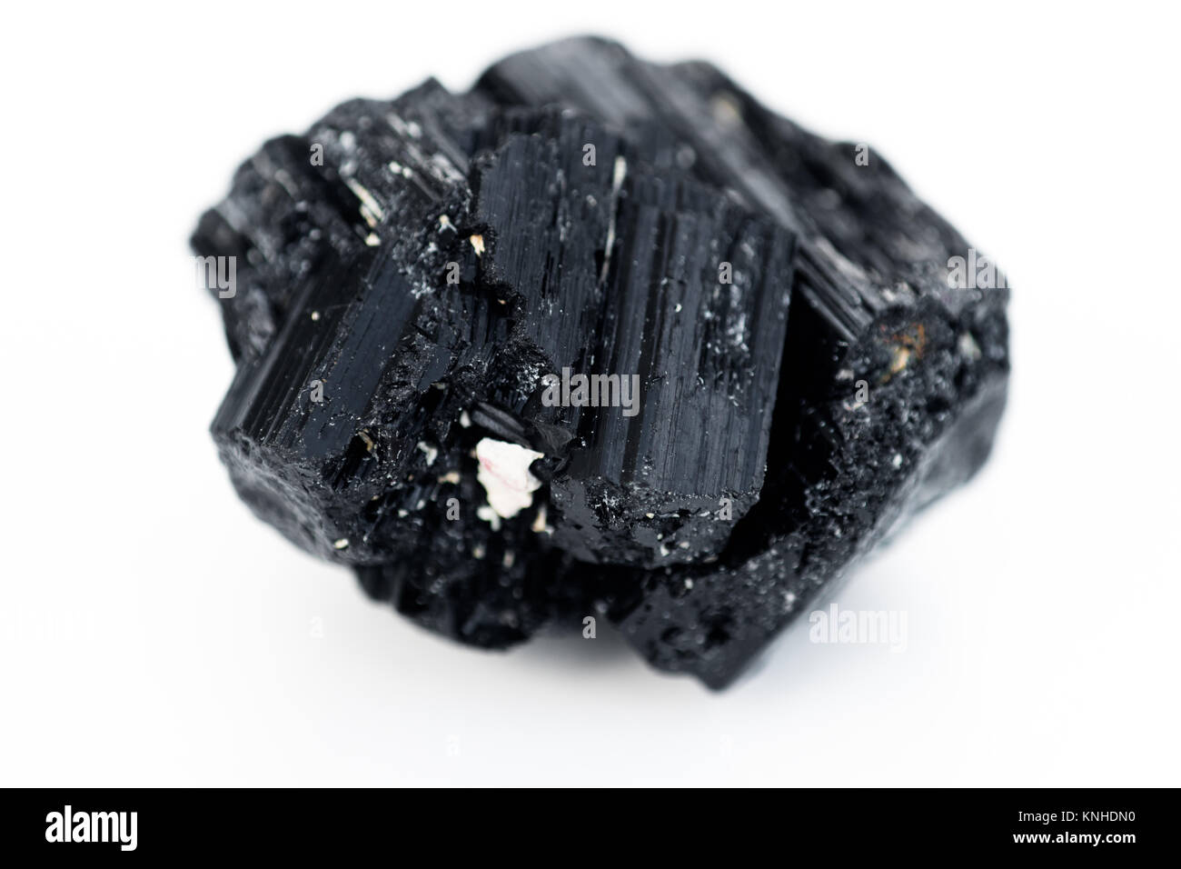 extreme close up of Tourmaline mineral isolated over white background ...