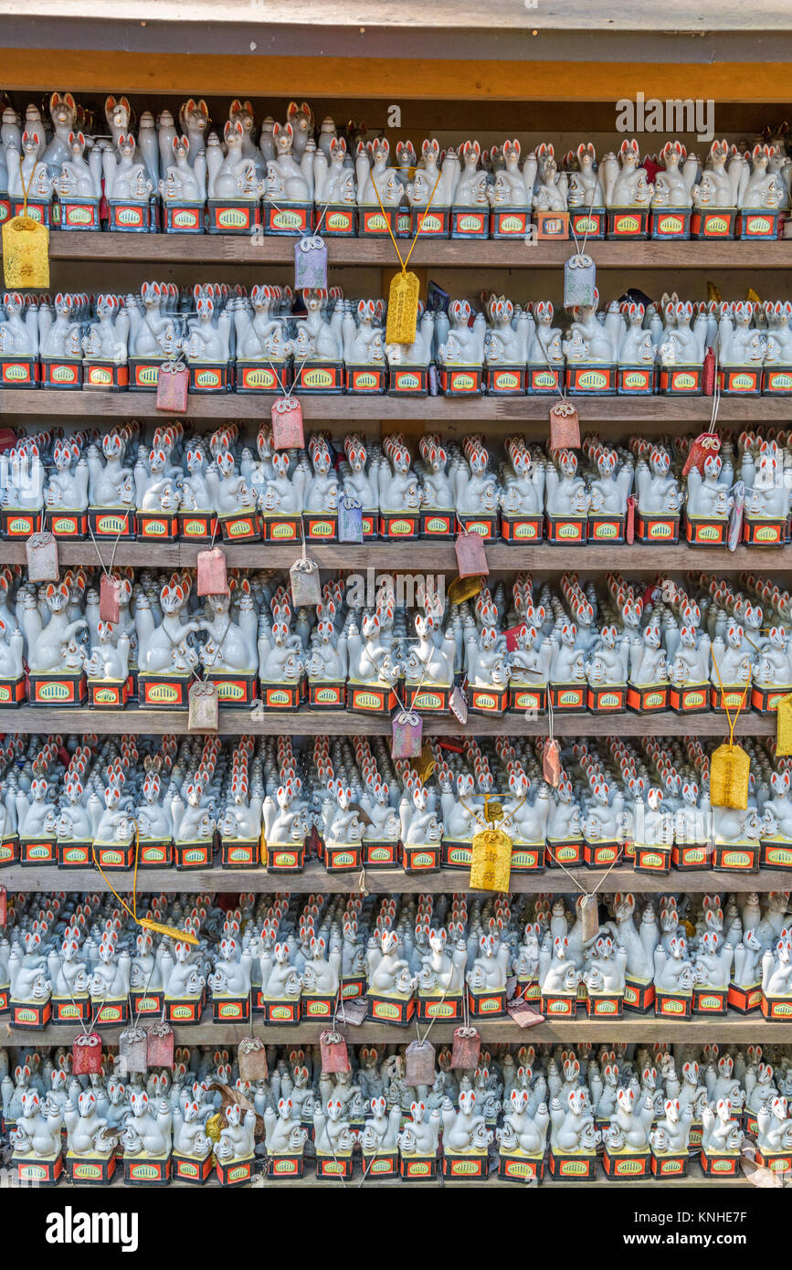 Small Inari statues at upper shrine of Sasuke Inari jinja. Founded by ...