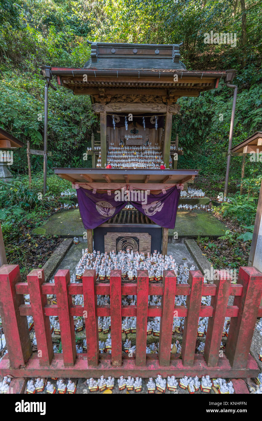 Sasuke Inari jinja. Small Inari statues at upper shrine. founded by ...