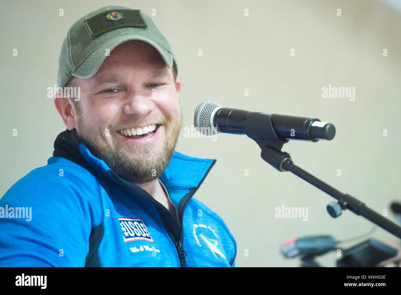 Country music singer Kyle Jacobs performs for U.S. troops during the ...