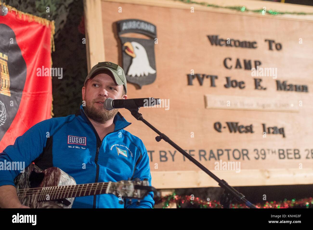 Country music singer Kyle Jacobs performs for U.S. troops during the ...