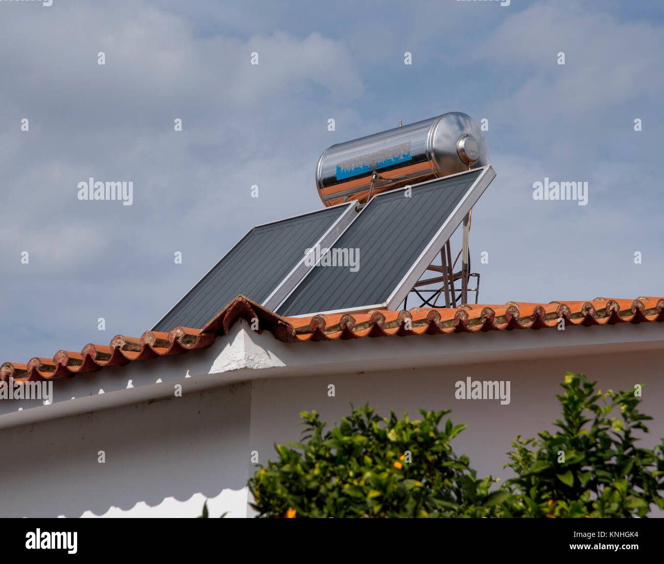 Solar hot water tank on a roof top in rural Greece, now seen on almost ...