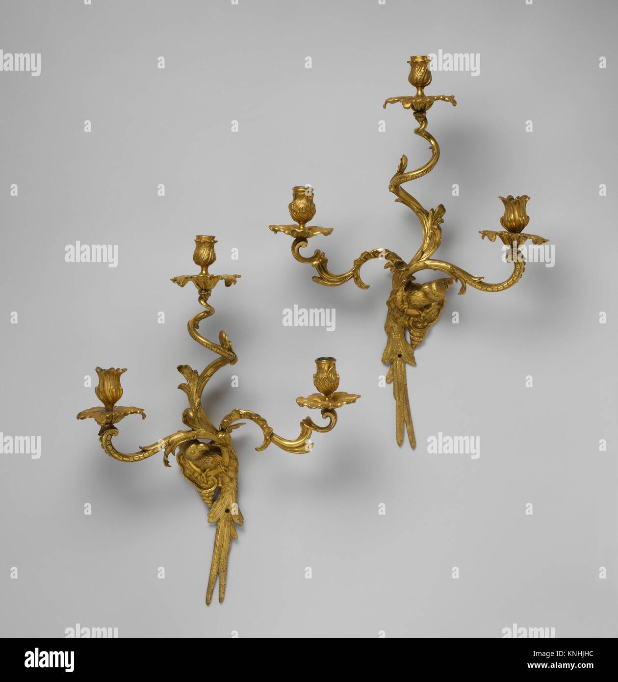 Set of four three-light wall brackets. Designer: Design attributed to ...