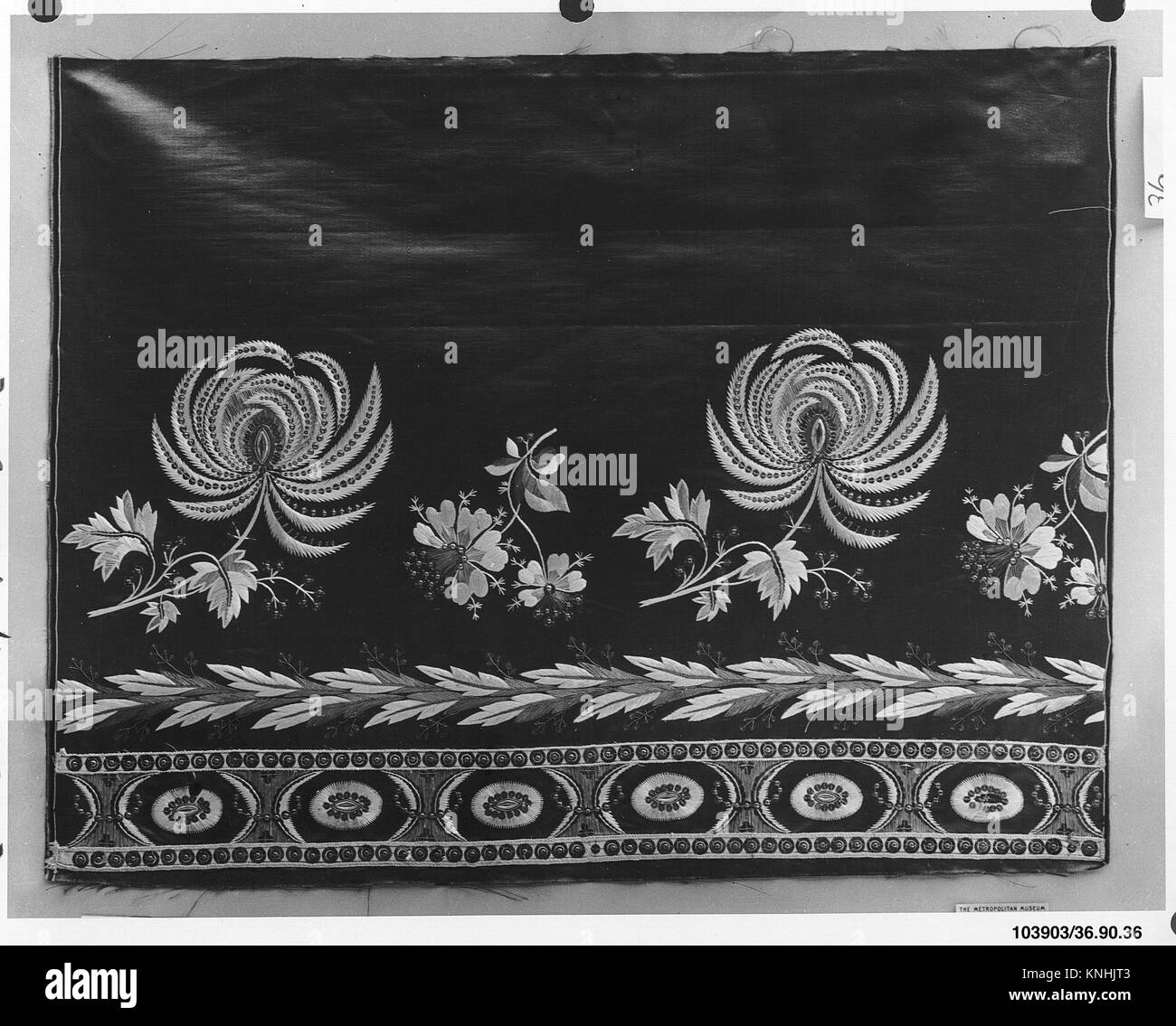 This ornate dress border showcases intricate embroidery and textile ...