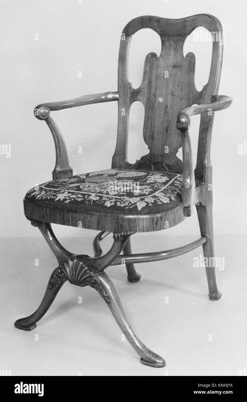 This armchair, a fine example of period furniture, showcases detailed ...