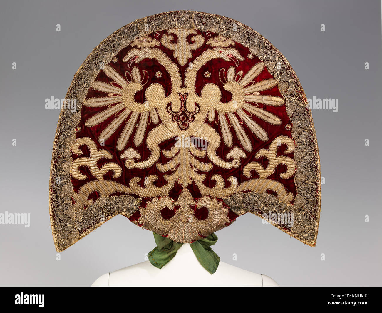 This headdress, with detailed craftsmanship, was worn as part of ...