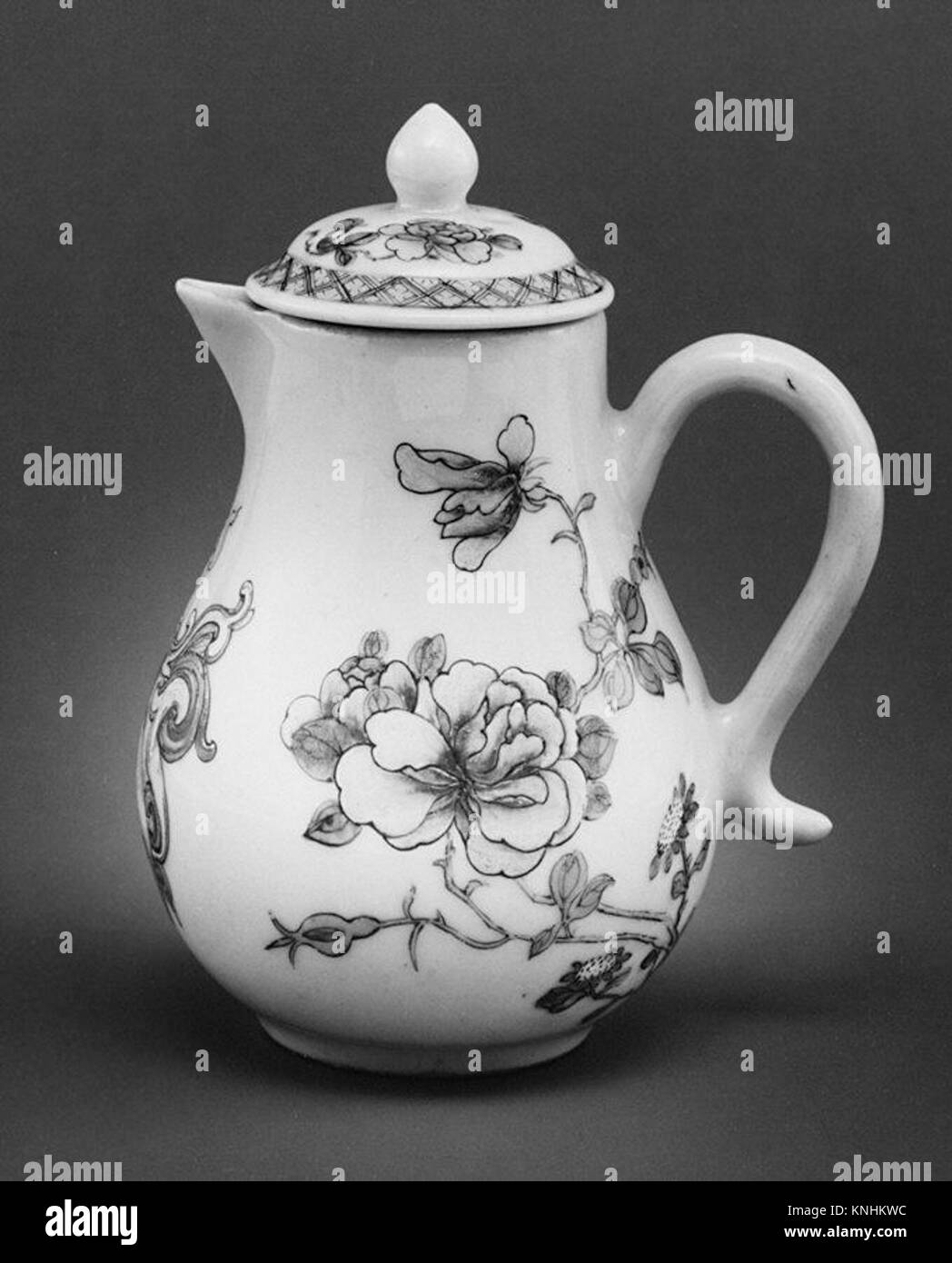This cream jug is a refined example of period tableware, showcasing ...